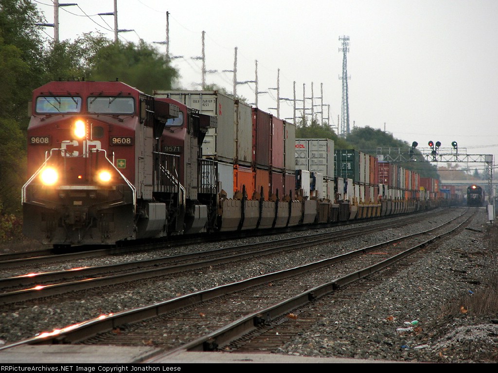 23T heads into the yard while 144 waits